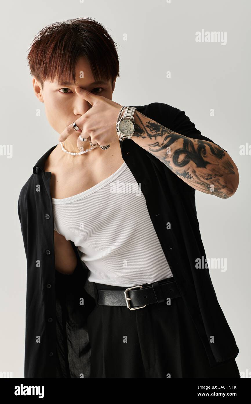 Dashing young Asian man displays his unique style and charisma in an ...