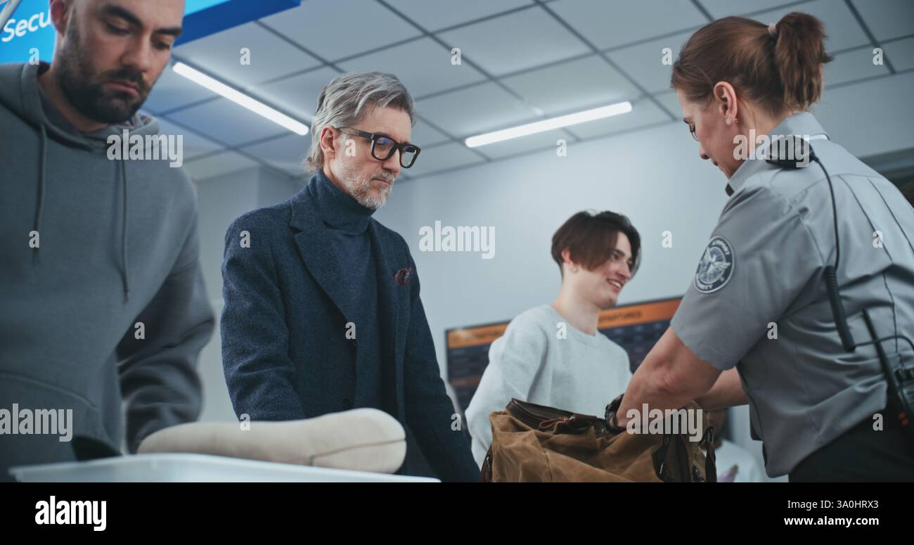 Security Checkpoint in Airport Terminal: Female TSA Worker Checking ...