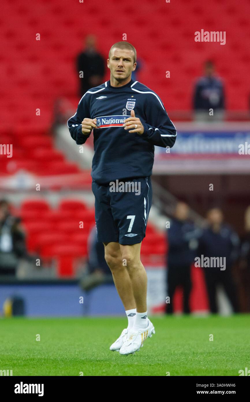 David Beckham of England warms up before a friendly match against the ...
