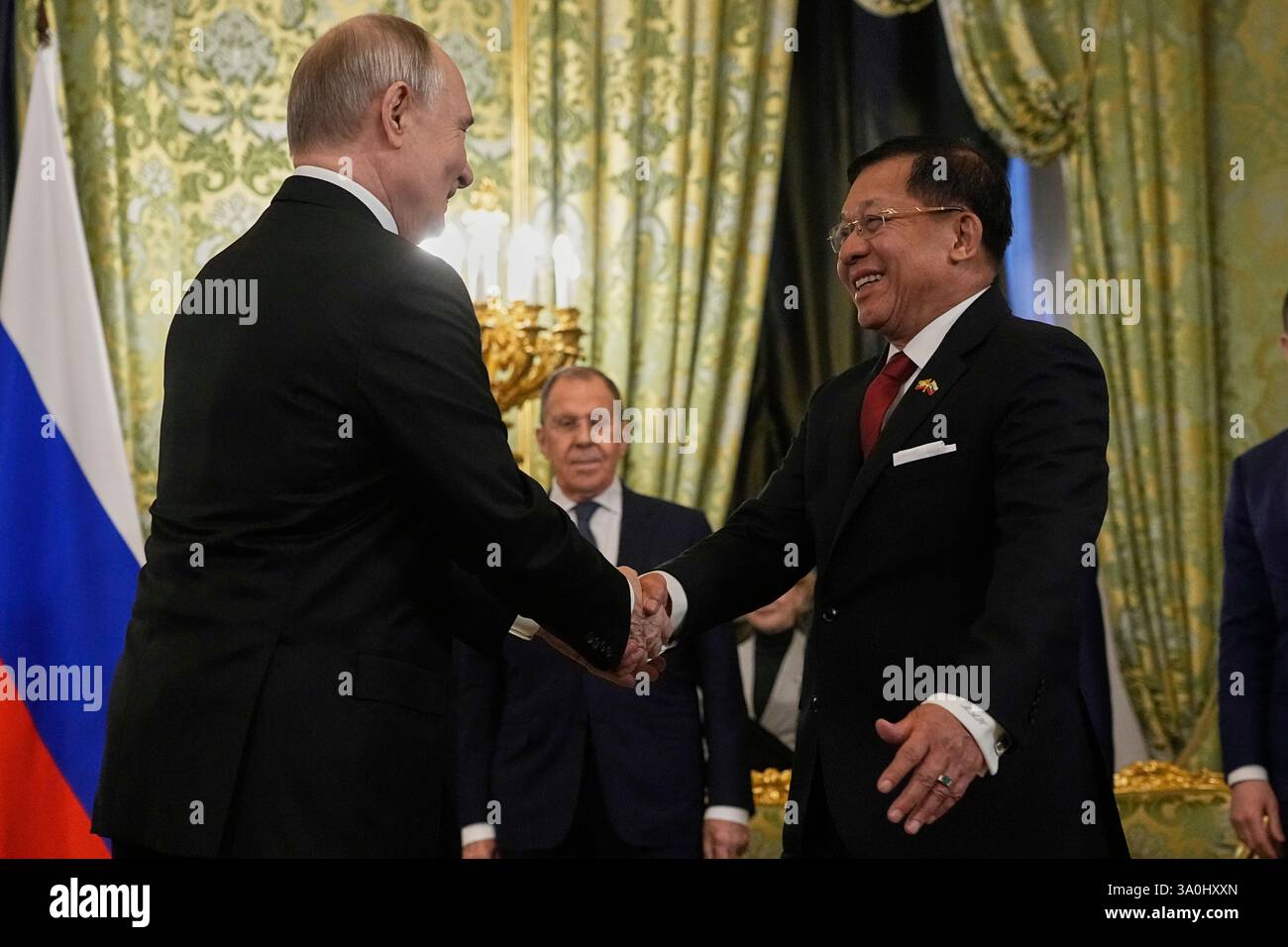 Russian President Vladimir Putin, left, and Myanmar's Military leader Senior Gen. Min Aung ...