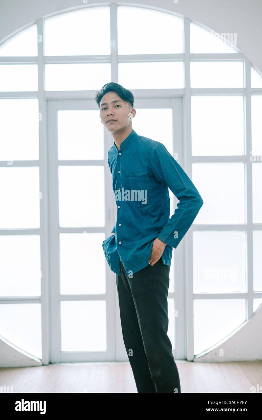 Man poses in creative hi-res stock photography and images - Alamy