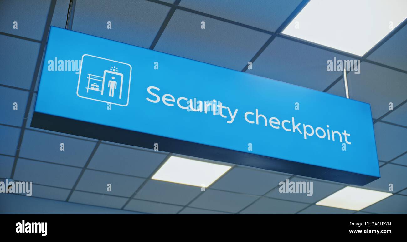 Modern International Airport Terminal: Big LED Blue Security Checkpoint Sign Hanging on Ceiling ...