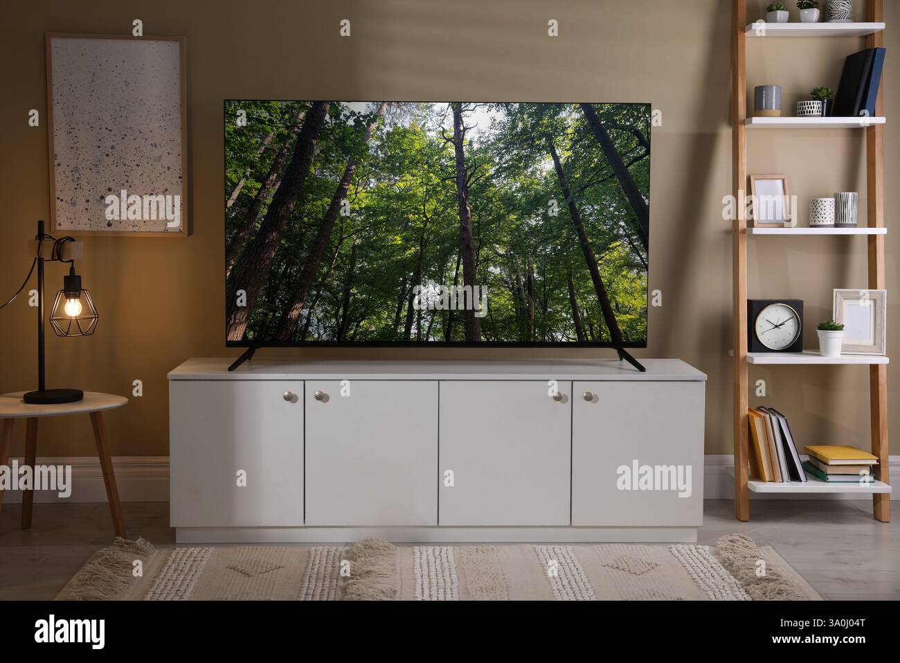 TV set with nature landscape on screen in room Stock Photo - Alamy