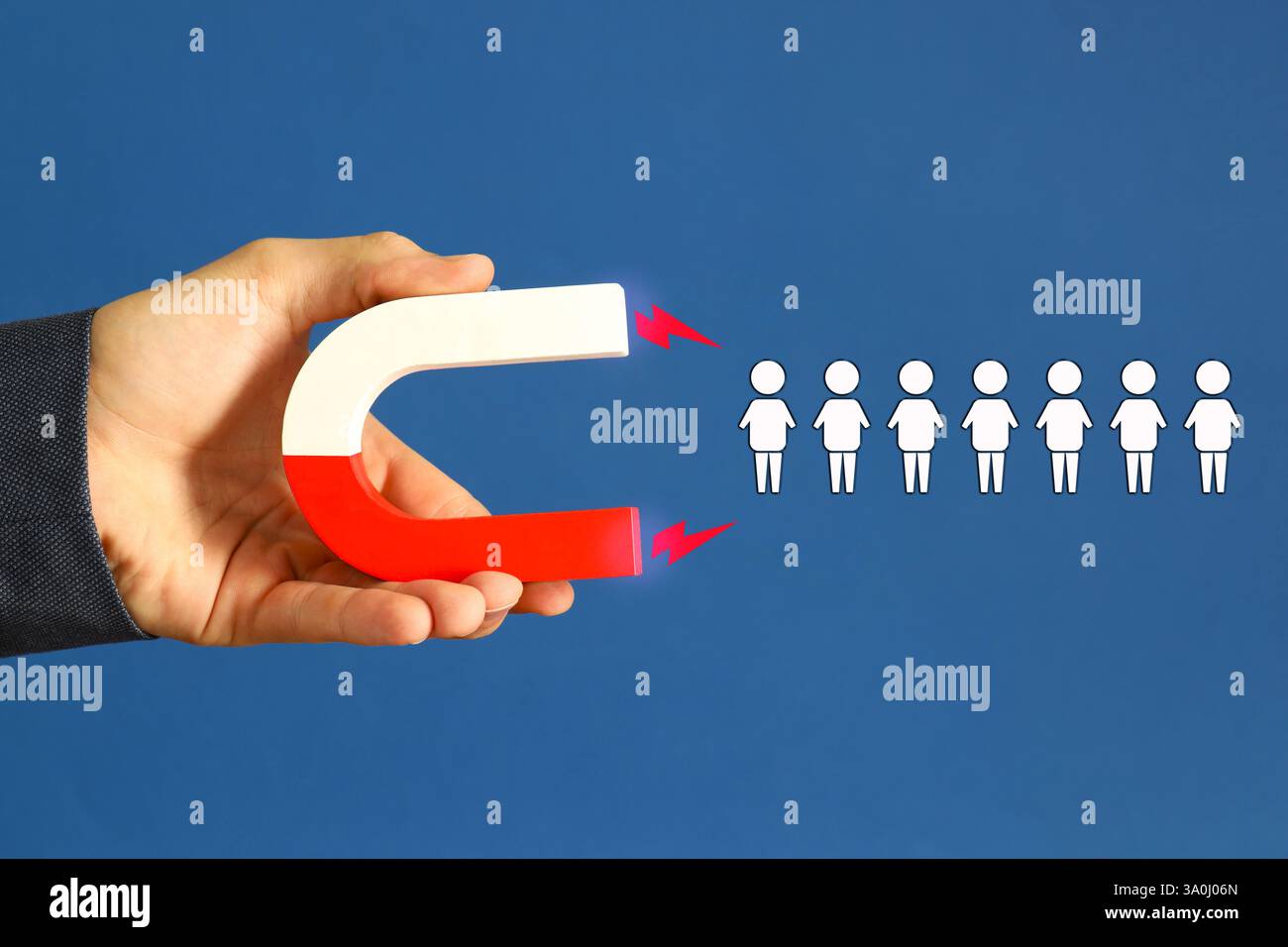 Man attracting white human figures with magnet on blue background ...