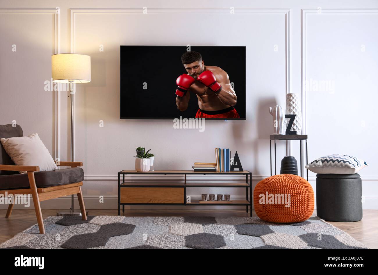 Boxing fight playing on TV set in room Stock Photo - Alamy