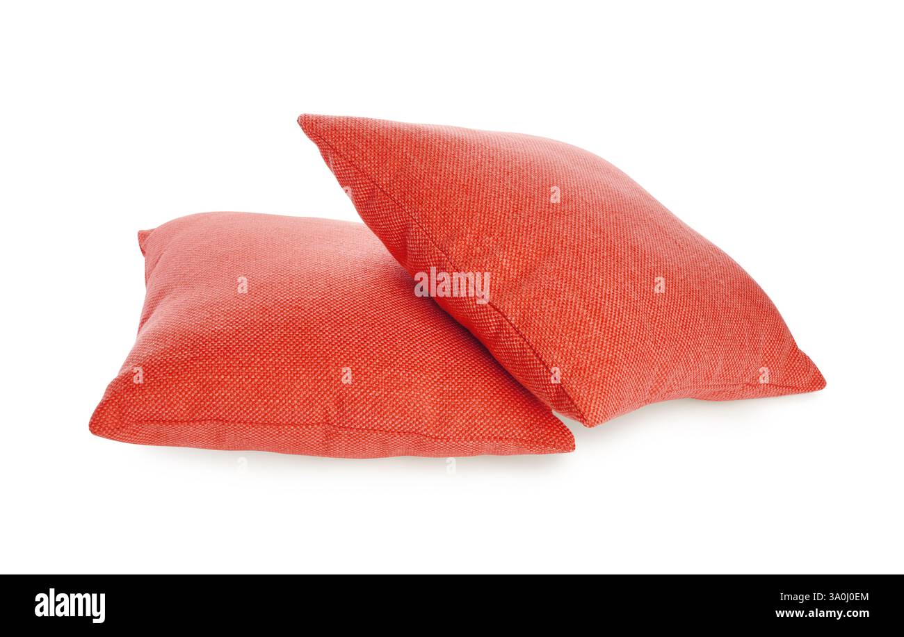 Pillows in red color isolated on white Stock Photo - Alamy