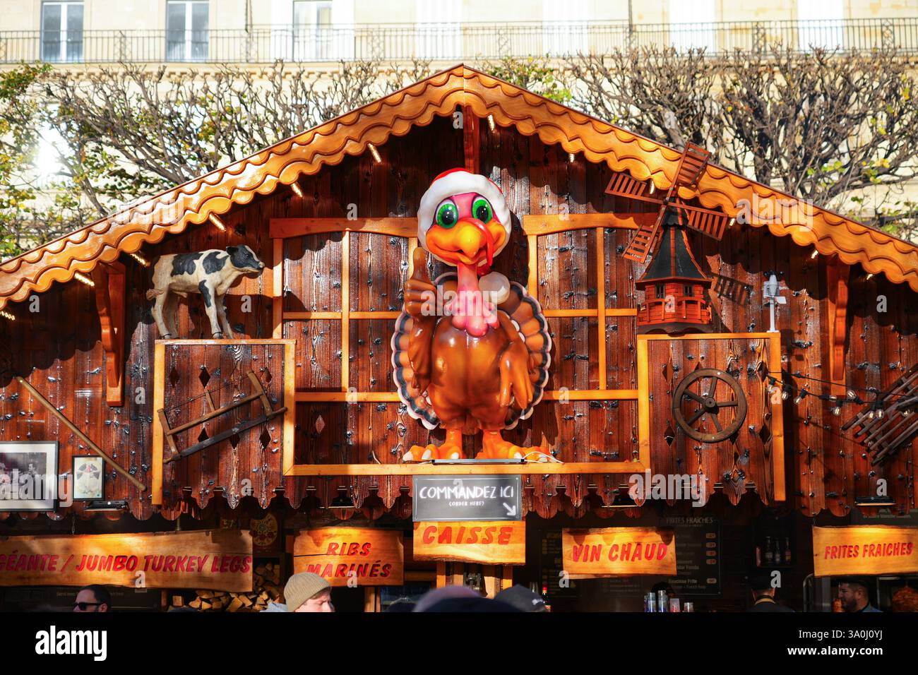 Turkey statue on the facade of a wooden chalet in the Christmas Market ...