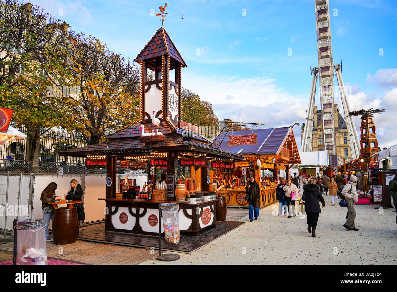 Alsatian sauerkraut booth with a clock tower in the Christmas Market of ...