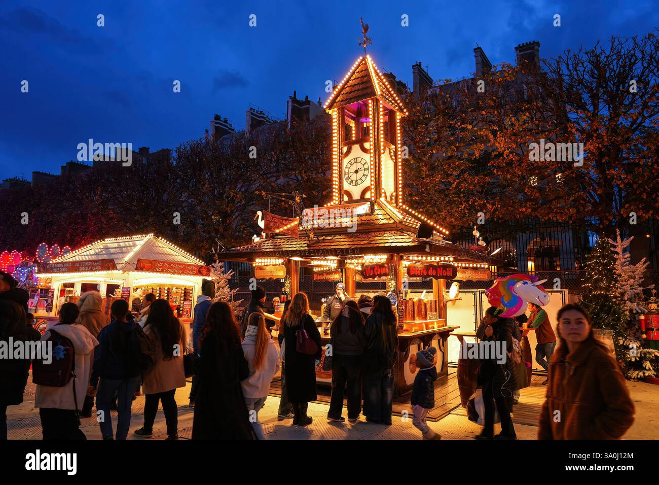 Alsatian sauerkraut booth with a clock tower in the Christmas Market of ...