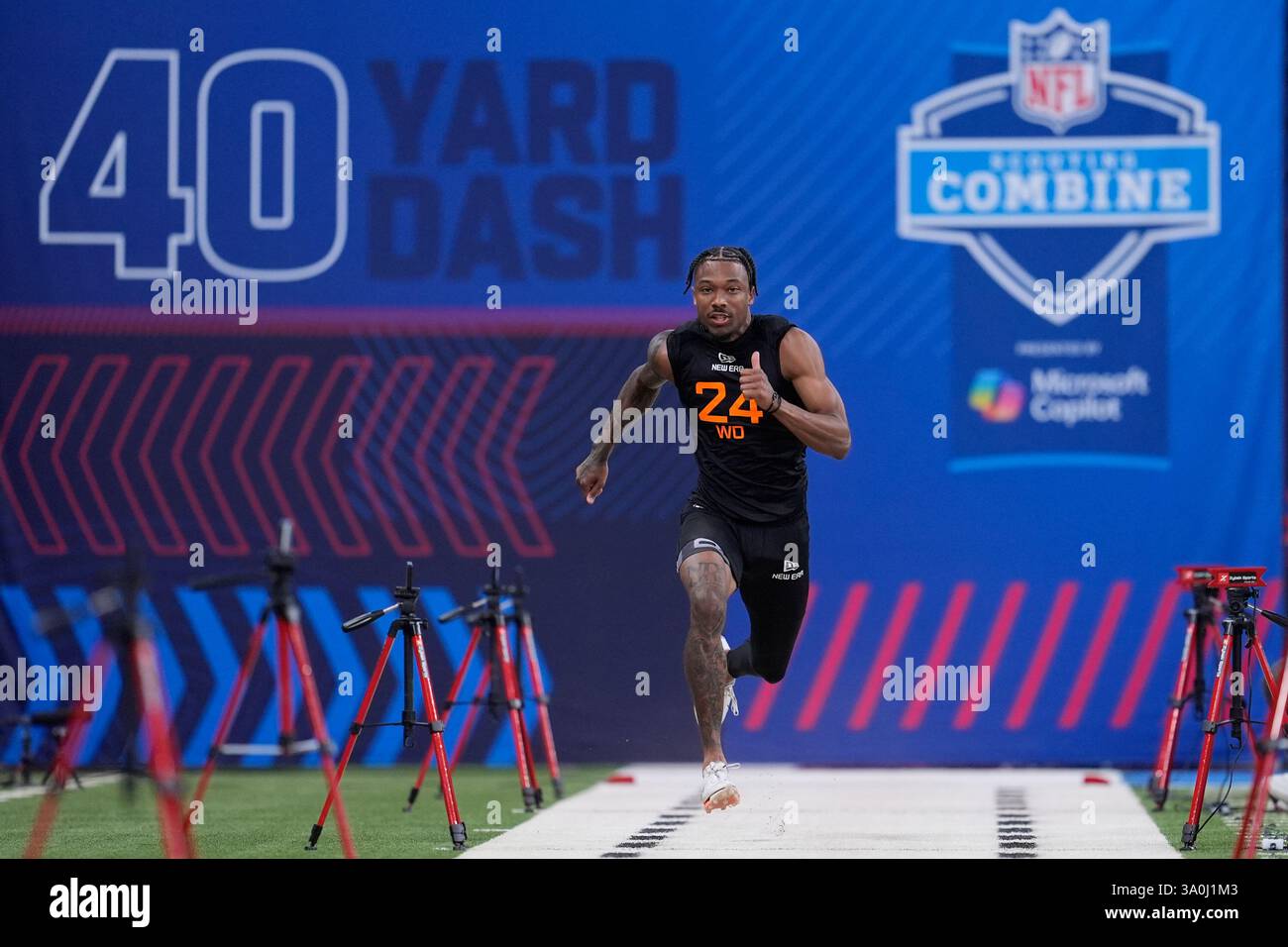 Oregon wide receiver Tez Johnson runs the 40-yard dash at the NFL ...