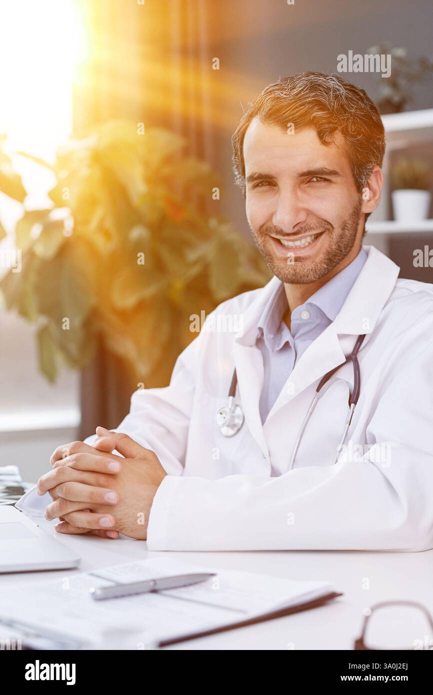Portrait of happy arabic doctor posing at clinic Stock Photo - Alamy