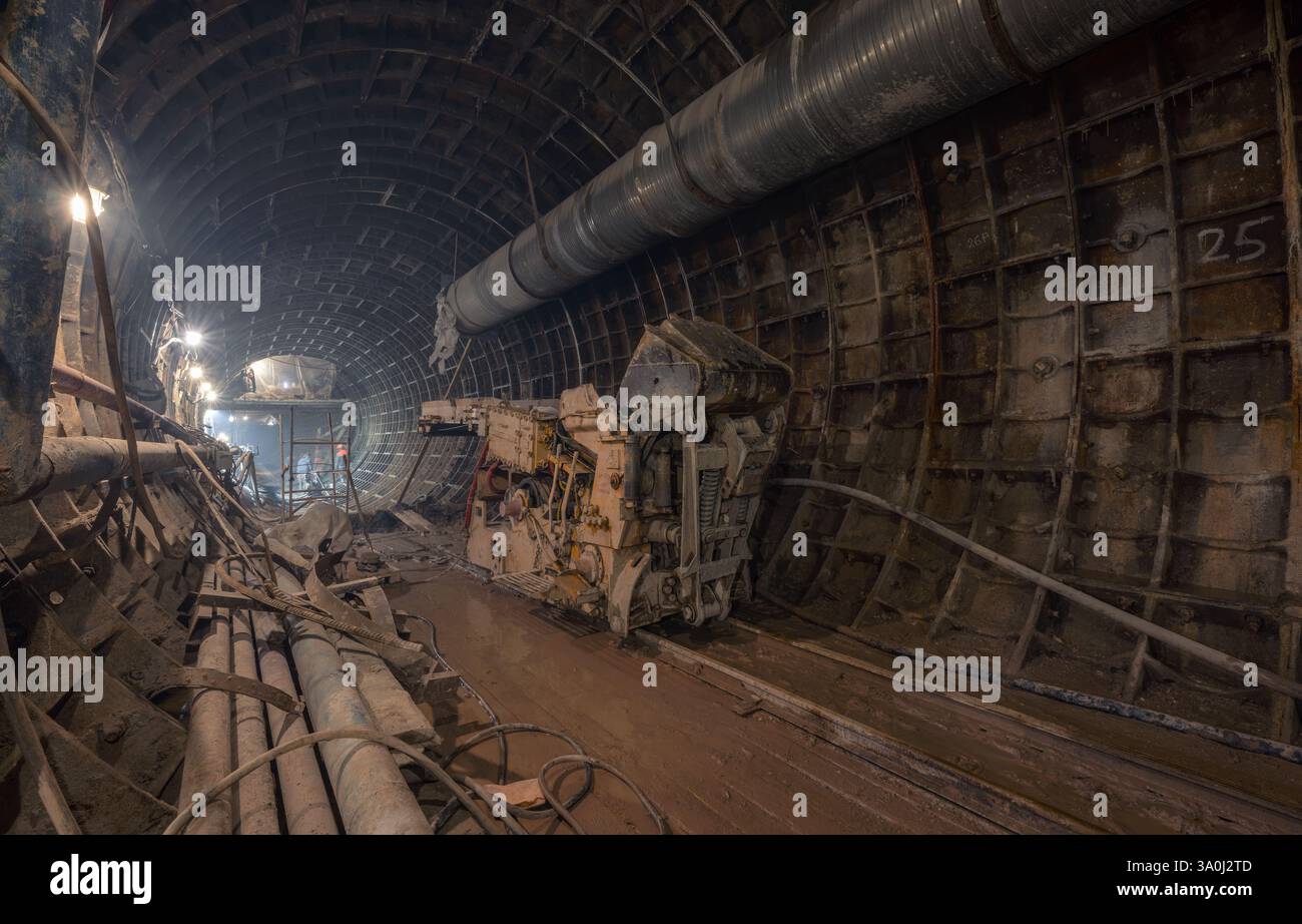 Metro construction, underground works in tunnel. Mine machine Stock ...