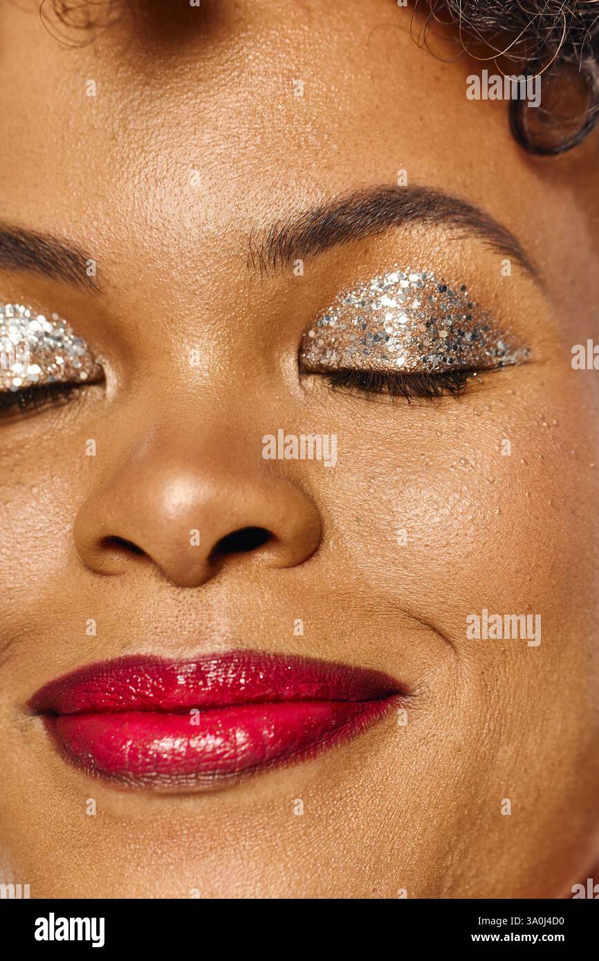 A stunning african american woman showcases glamorous makeup with ...