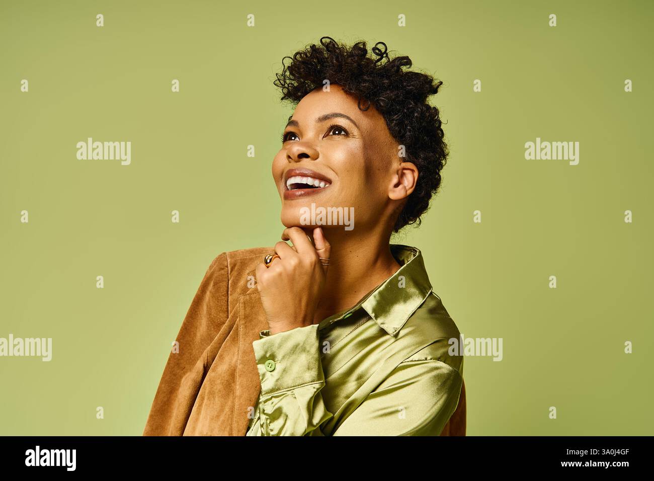A stylish African American woman beams with a charming smile in a ...