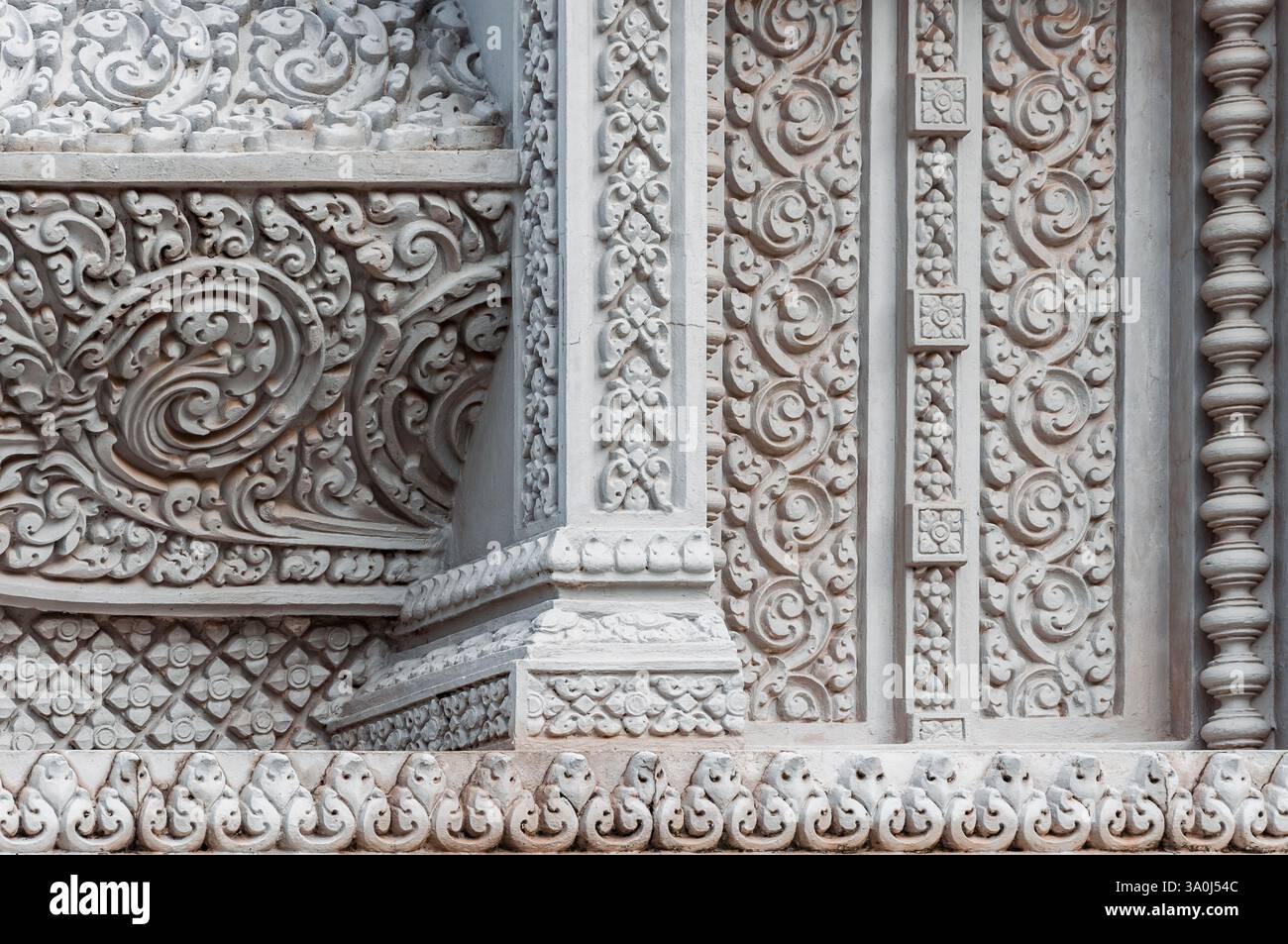 Phnom Penh, Cambodia - May 6, 2009: Intricate stone carvings on a ...