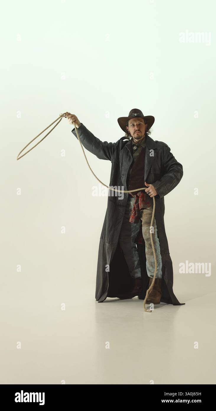 Full-length portrait of brutal man in vintage style country clothes ...