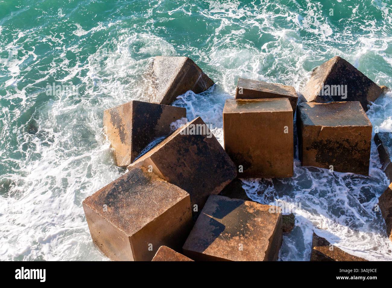Concrete blocks of sea defense or mound seawall in Cadiz, Spain Stock ...