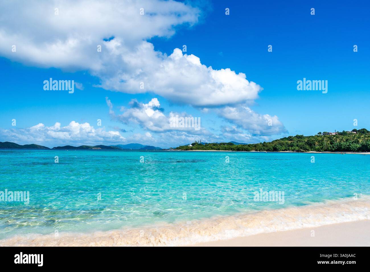The calm blue waters and white sand at Secret Sands Beach St. Thomas ...