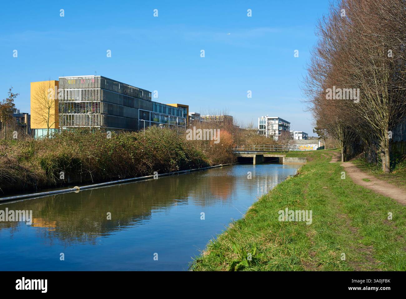 The New River at Hornsey, London UK, with the New River Village housing ...