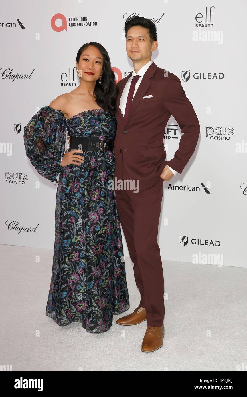 LOS ANGELES - MAR 2: Shelby Rabara, Harry Shum Jr at the Elton John ...
