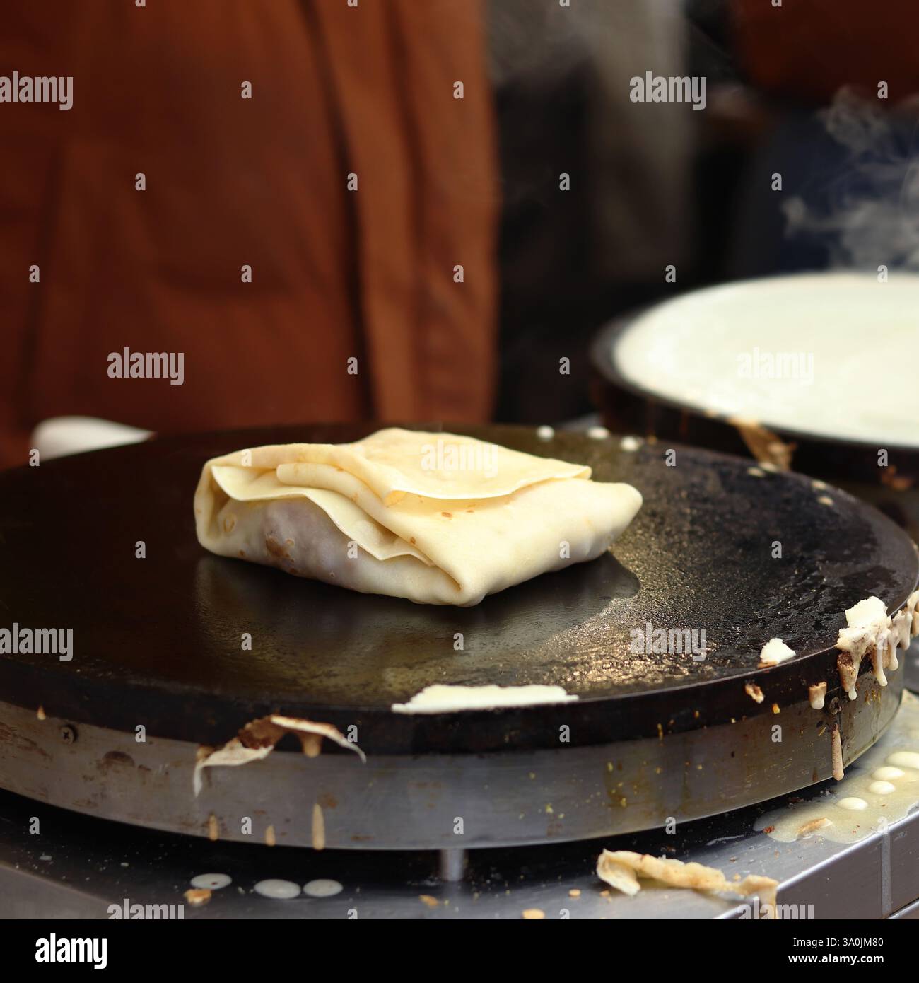 Process making thin pancake batter hi-res stock photography and images ...