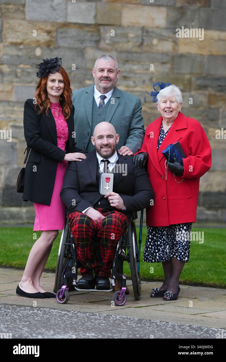 Paralympian Nathan Macqueen, with wife Tara, father Gary and ...