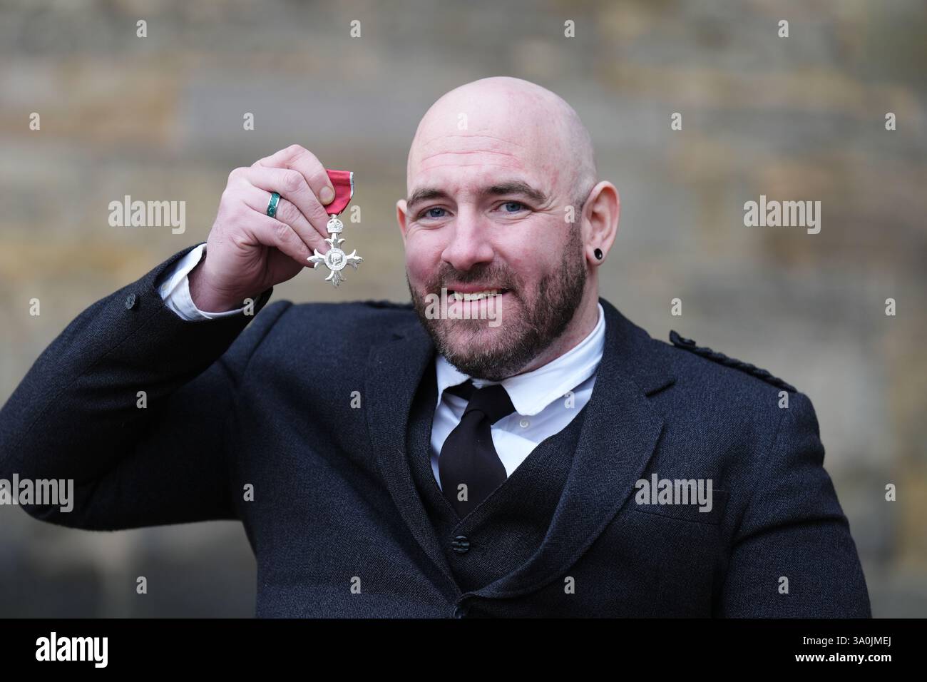 Paralympian Nathan Macqueen after being made a Member of the Order of ...