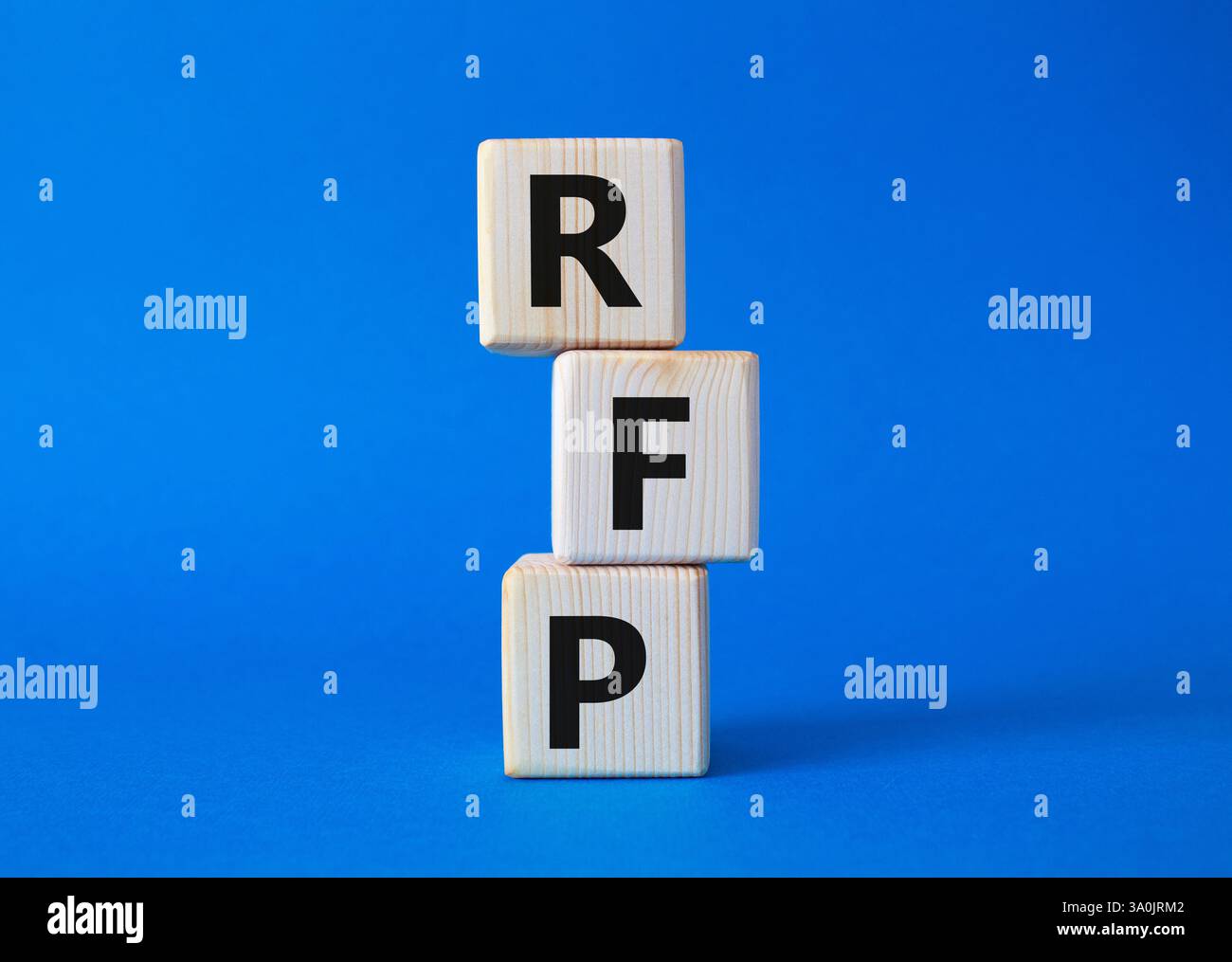 RFP - Request for Proposal. Wooden cubes with word RFP. Beautiful blue ...