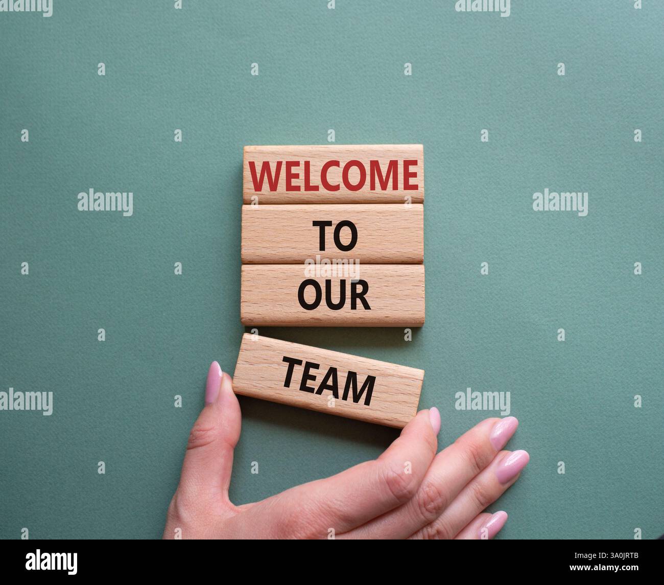 Welcome to our team symbol. Concept words Welcome to our team on wooden ...