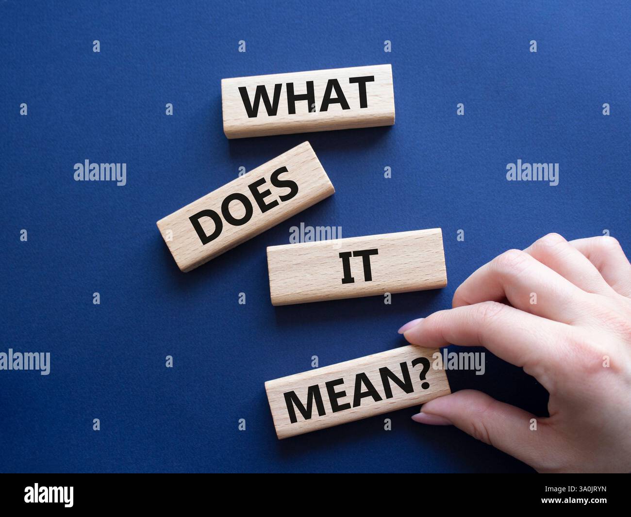 What does it mean symbol. Wooden blocks with words What does it mean ...