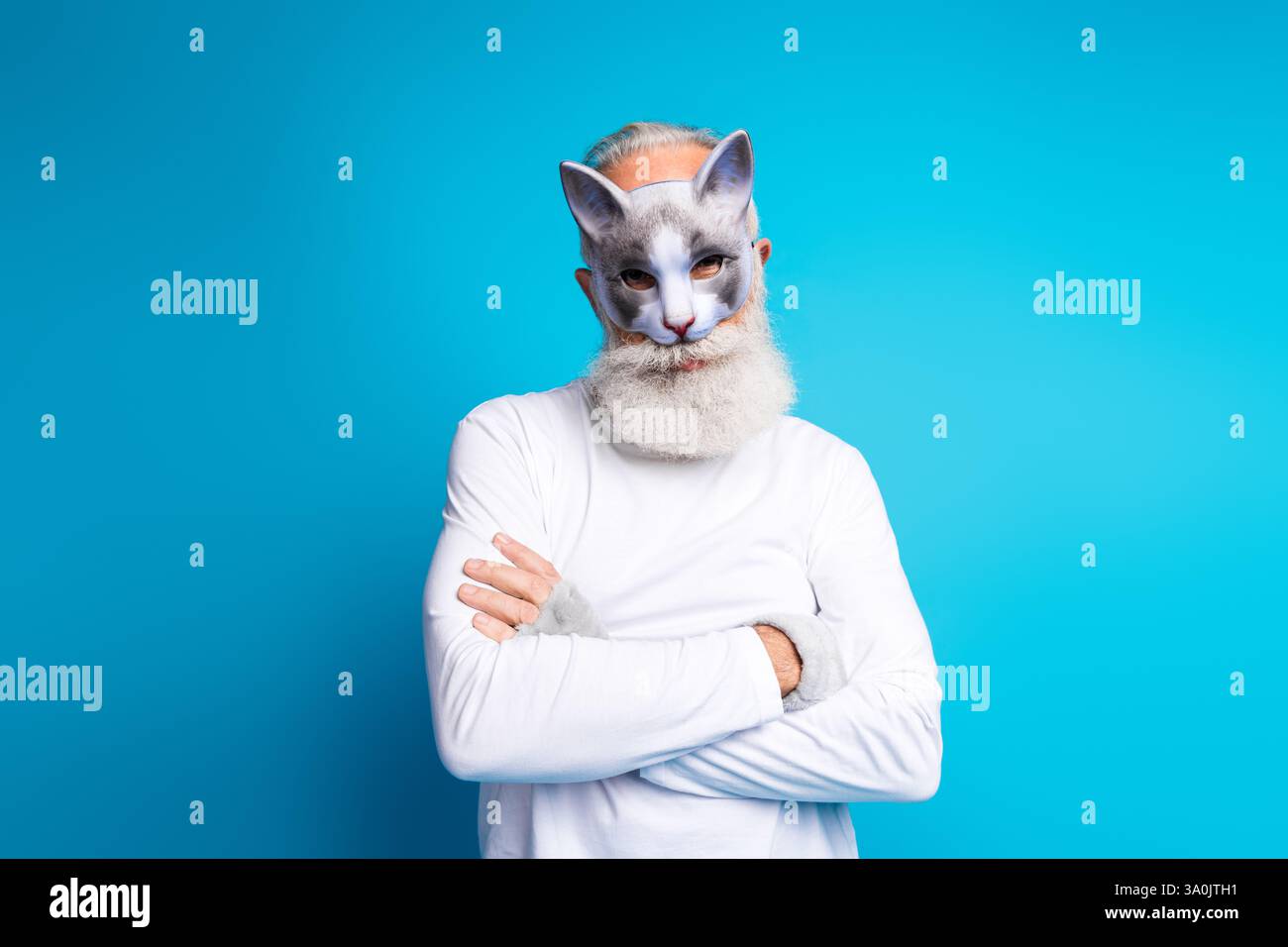 Elderly Man in Cat Mask with Blue Background Illustrating Humor and ...
