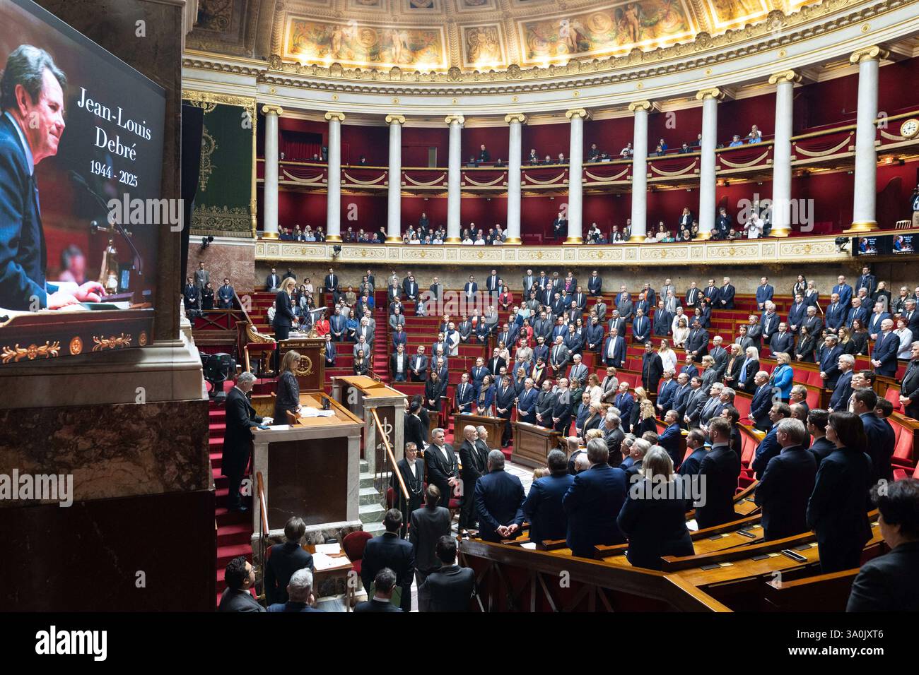 Paris, France. 04th Mar, 2025. French MPs stand in the parliament in ...