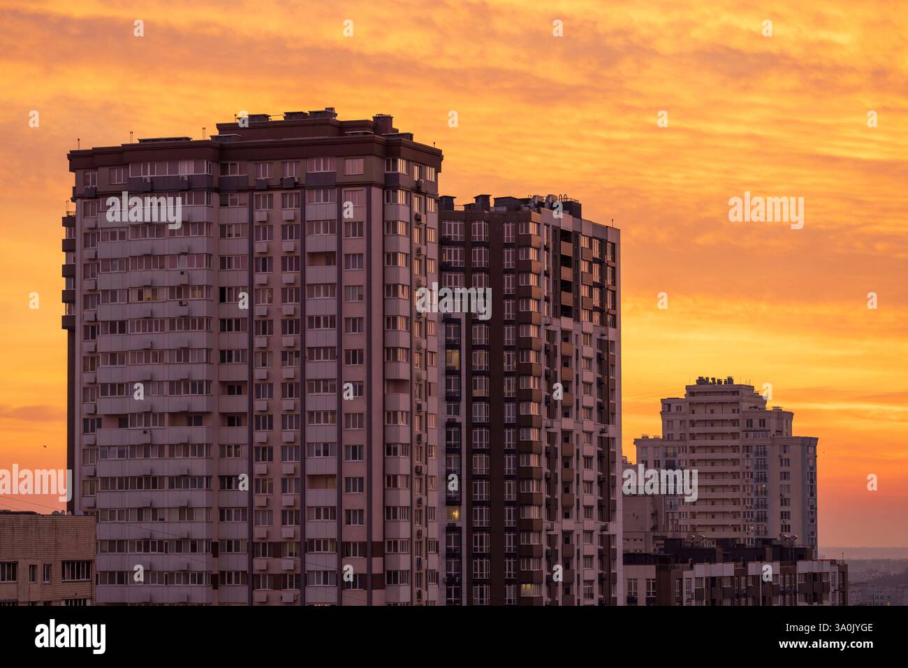 Beautiful sunset behind high-rise buildings of Kyiv. Kyiv Kyiv City ...