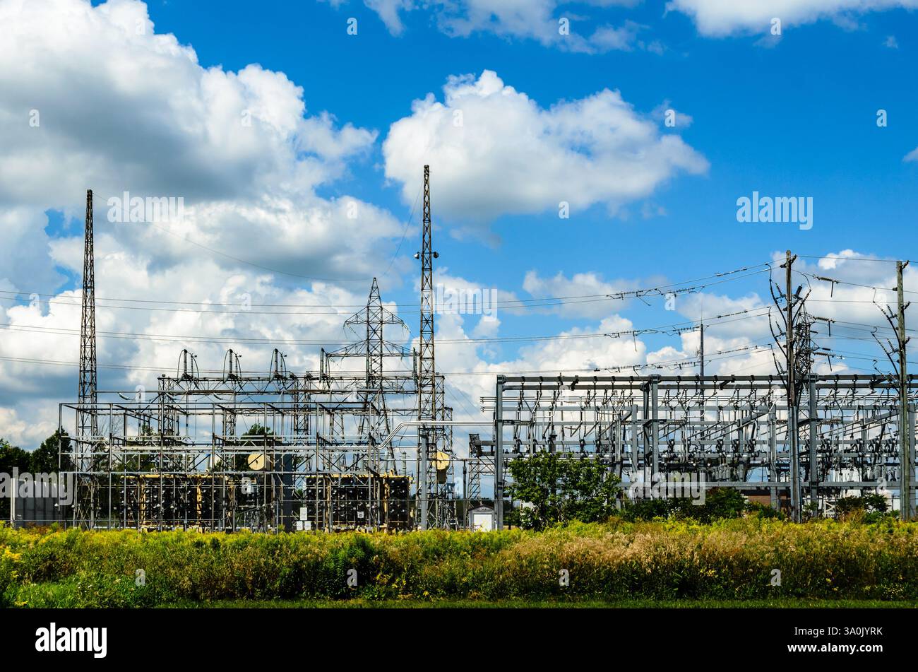electrical sub-station in a field under a cloudy blue sky Stock Photo ...