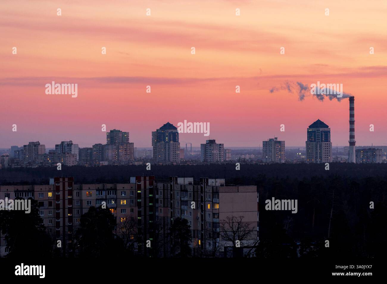 Beautiful sunset behind high-rise buildings of Kyiv. Kyiv Kyiv City ...