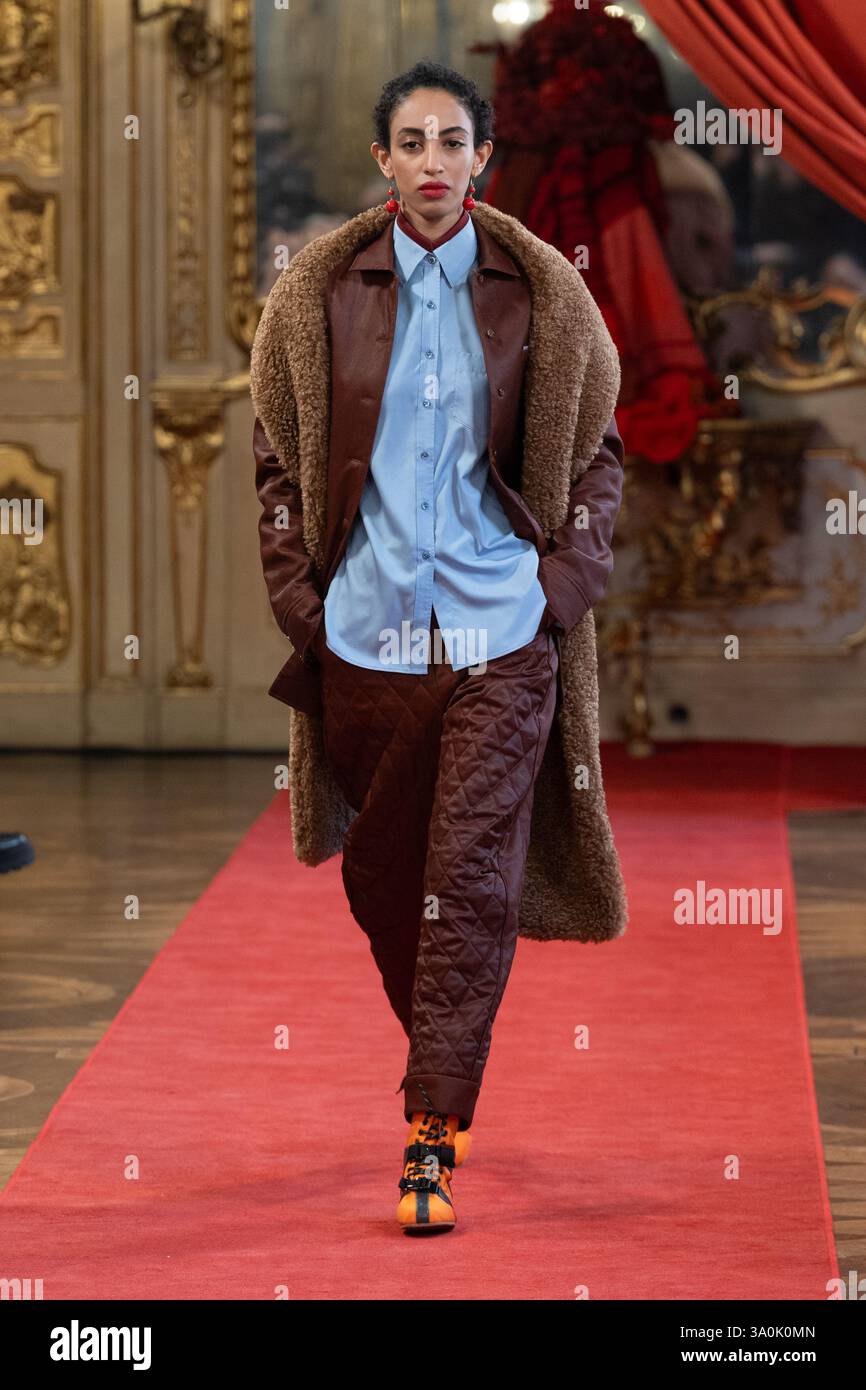 Milan, Italy. 02nd Mar, 2025. A model walks the runway during the HUI ...