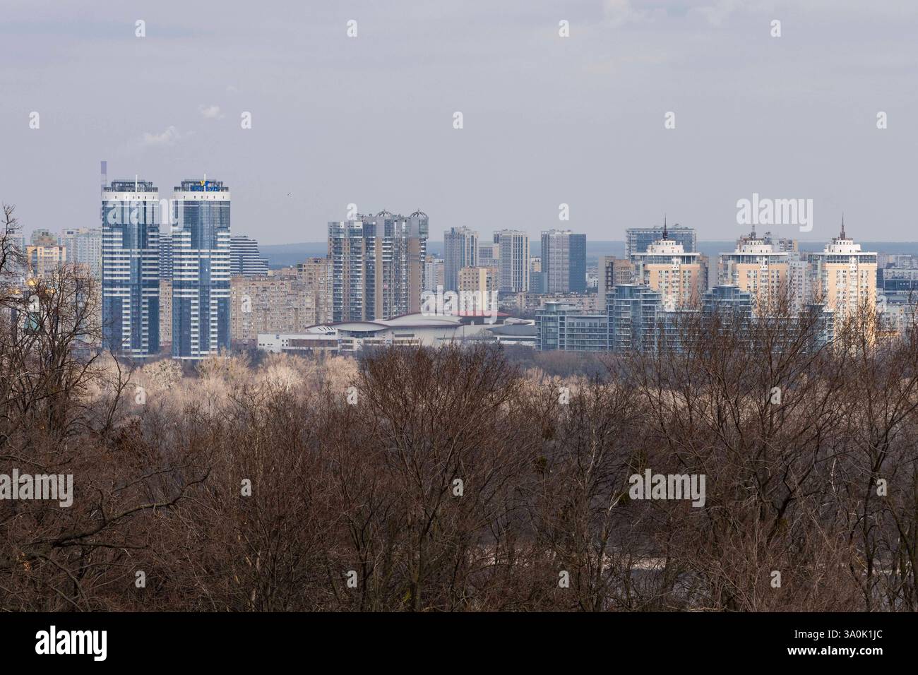 View of many mid-rise and high-rise buildings with the Dnipro river in ...