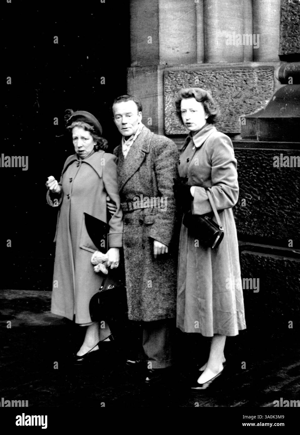 Mr. and Mrs. William Bentley and their daughter Iris are seen as they ...