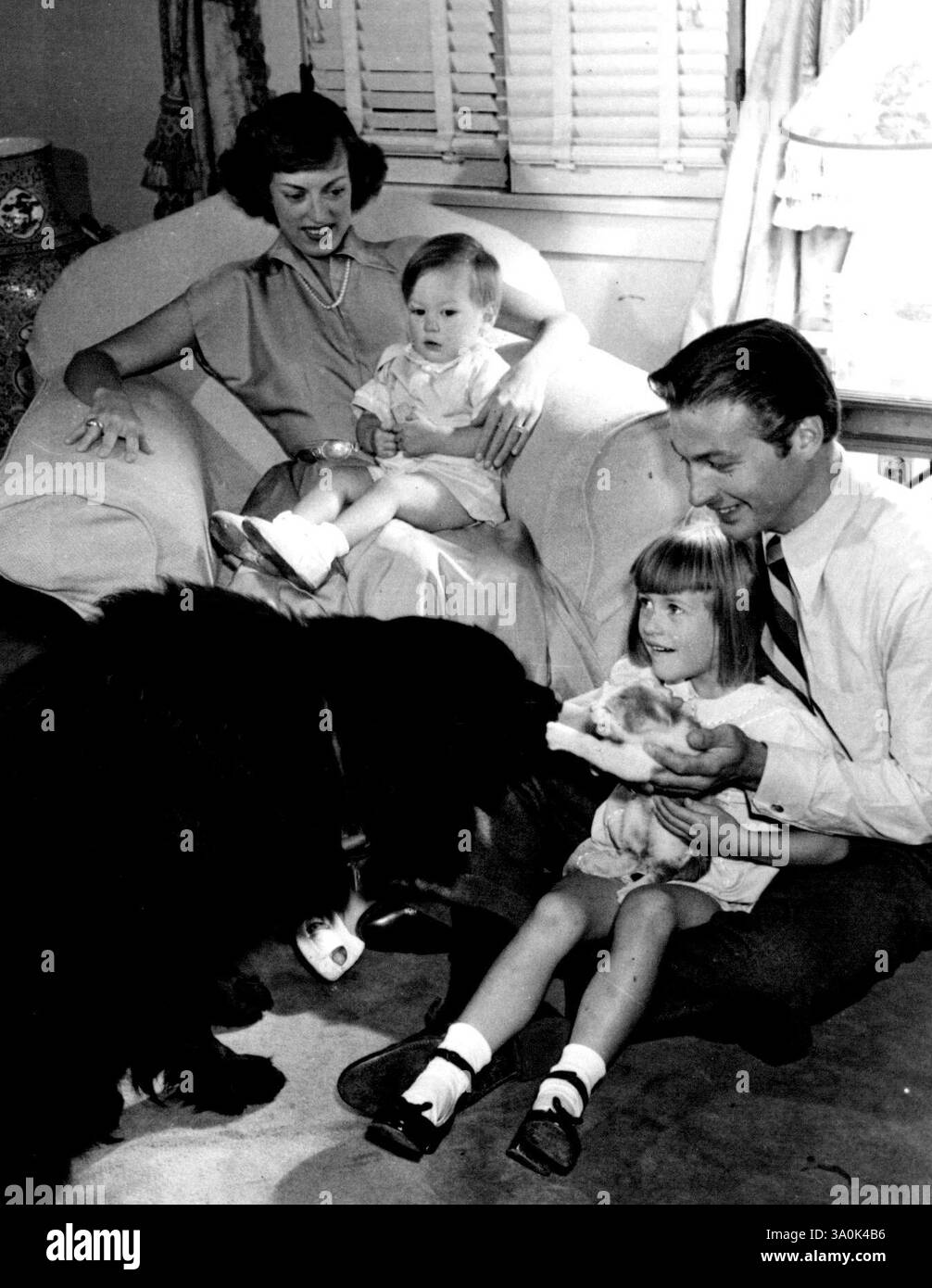 The Barker family includes wife Constance, son Alexander and a little ...