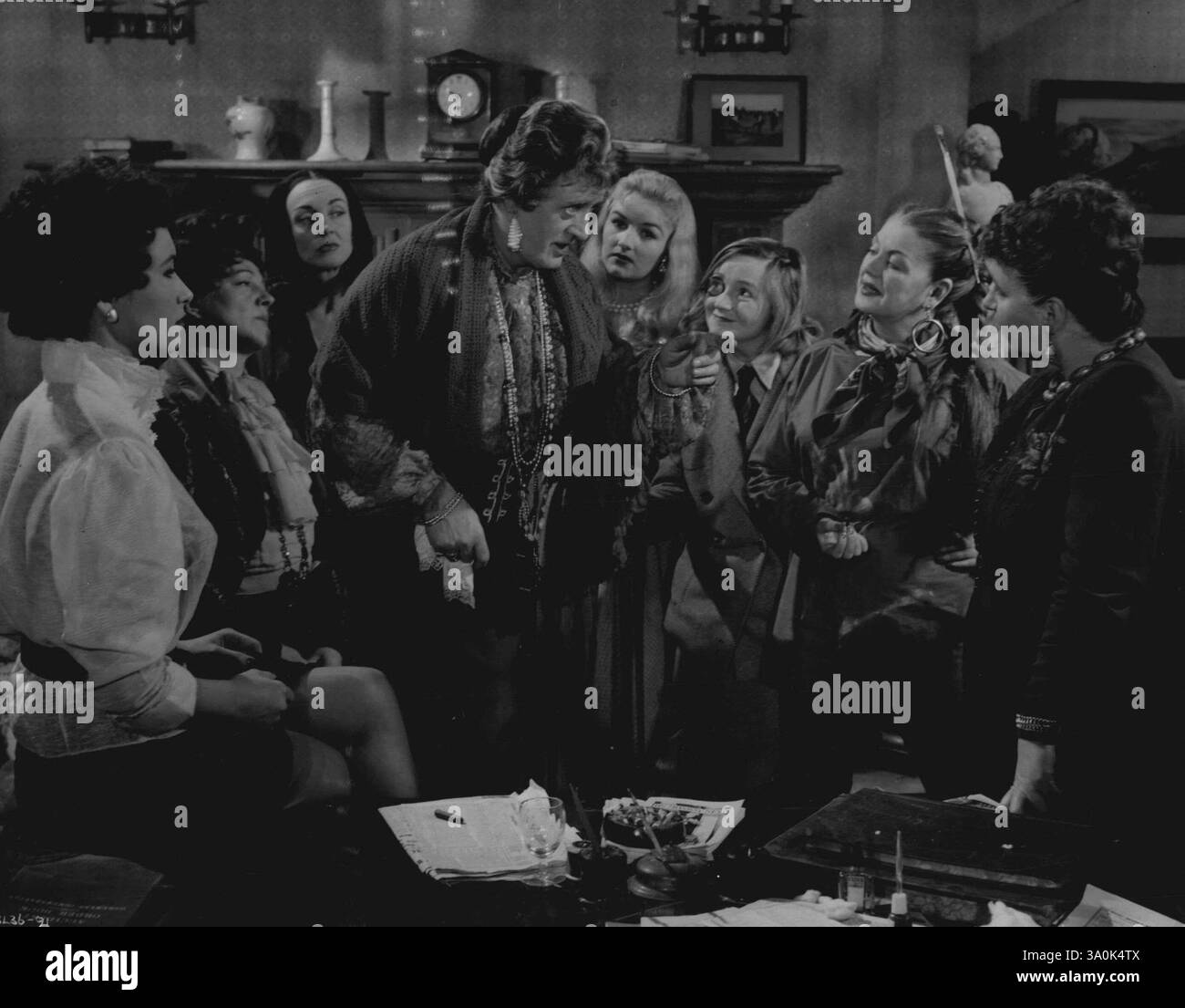 "The Belles of St. Trainians" Left to right: Mlle de St. Emelion ...