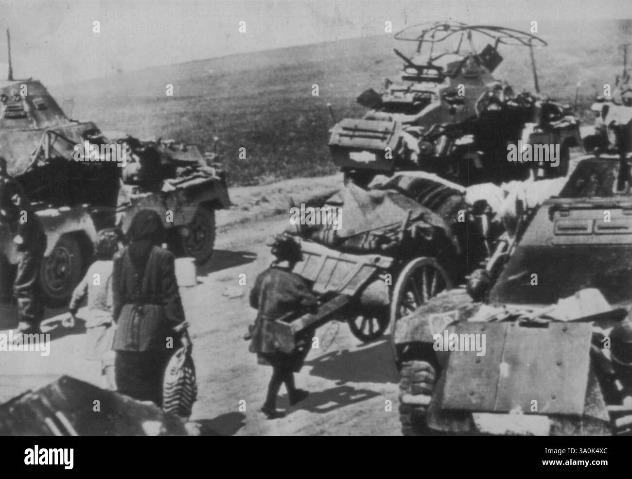 Greek Refugees Surrounded By German Forces - Greek refugees move along ...