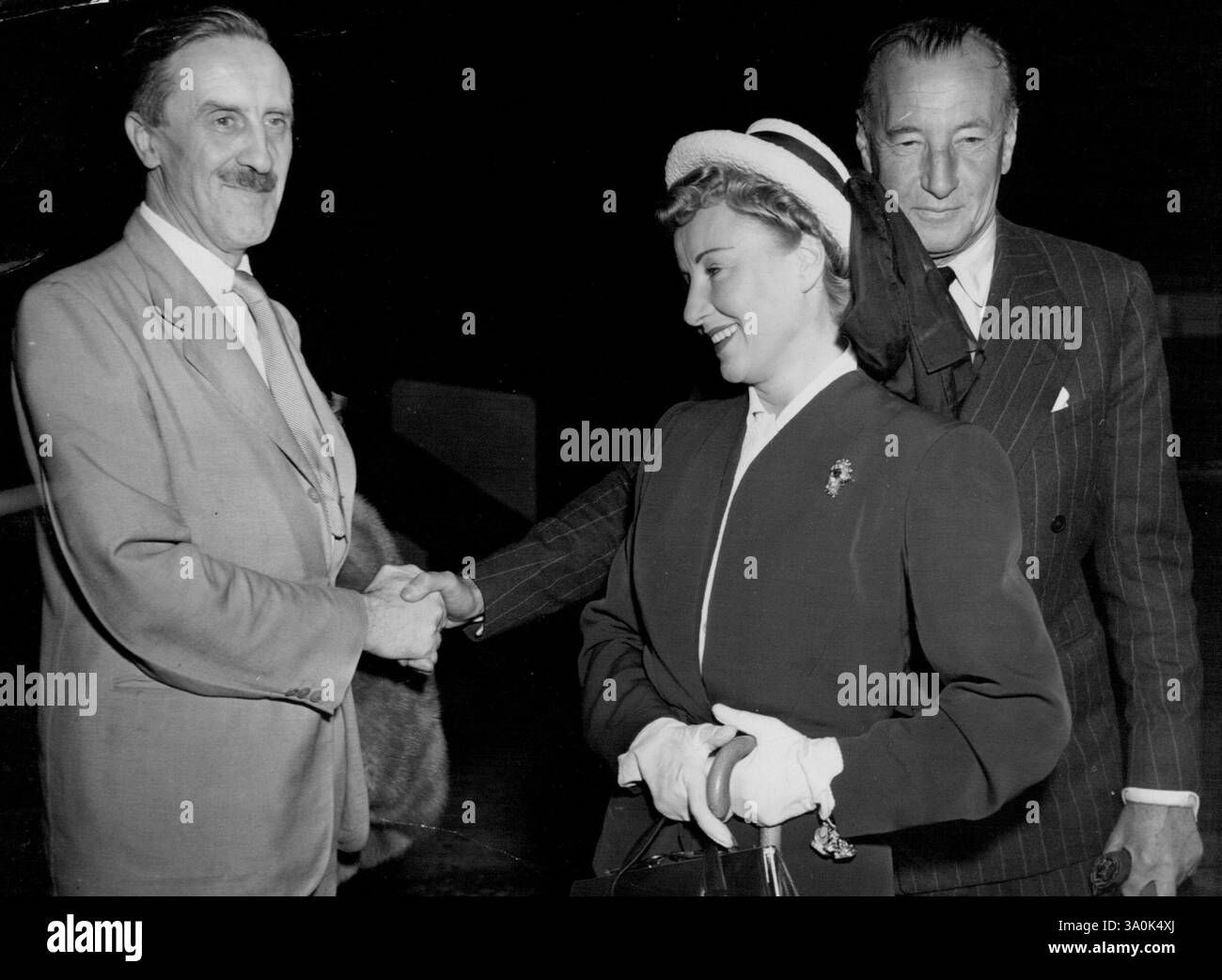 Inverchapels Arrive in Washington - Lord Inverchapel (right) shakes ...