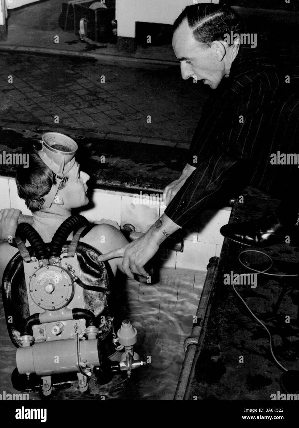 Batterham discusses tests at city baths of new apparatus with Dr ...