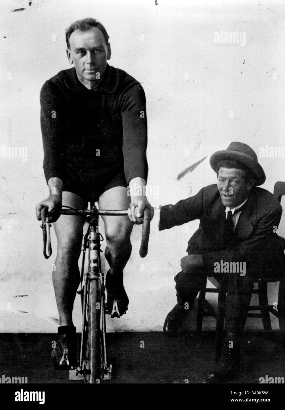 Racing was tough when J. J. (Pop) Beasley (left) battled to win a ...