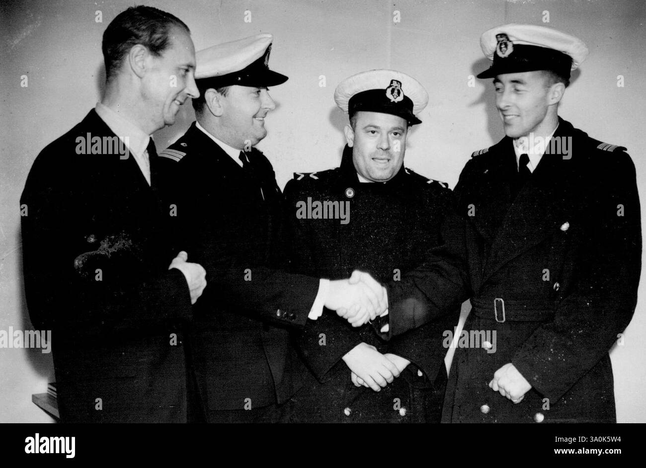"Mercury" Arrives Back From New York -- (L to R) Major R. H. Mayo ...