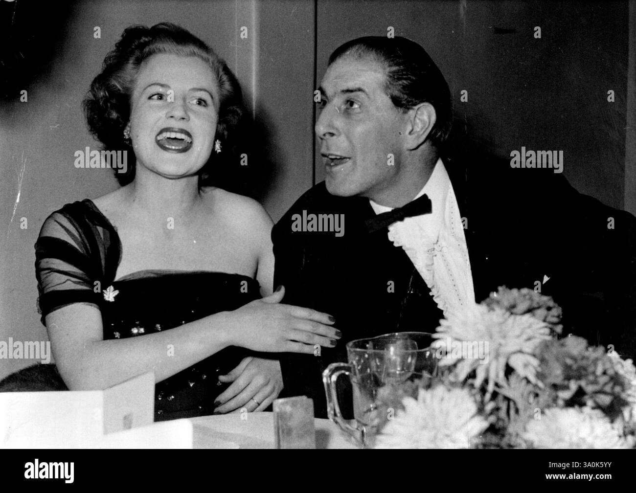 Lady Rendlesham draws photographer Baron's attention to friends on the ...