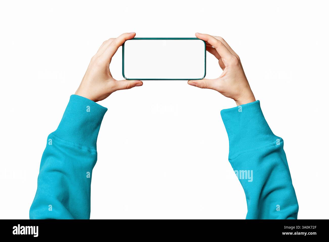 Isolated green smart phone in horizontal position in woman's hands in ...
