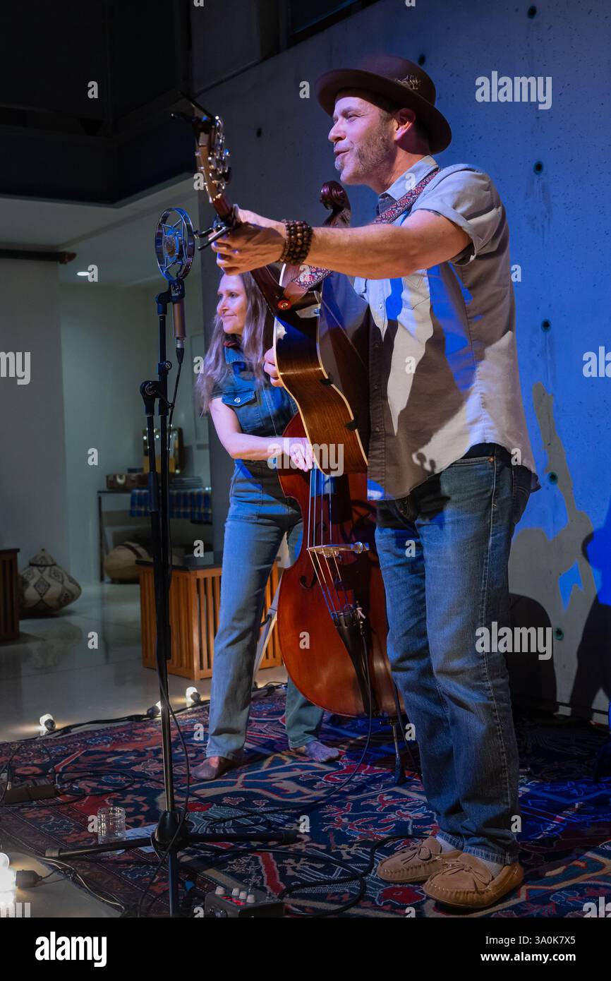 Singer, songwriter, Scott Cook with Pamela Mae in concert Stock Photo ...