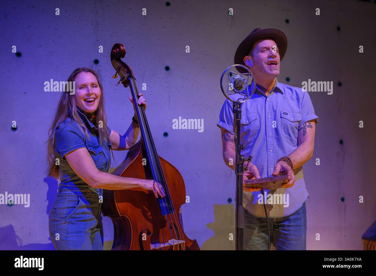 Singer, songwriter, Scott Cook with Pamela Mae in concert Stock Photo ...