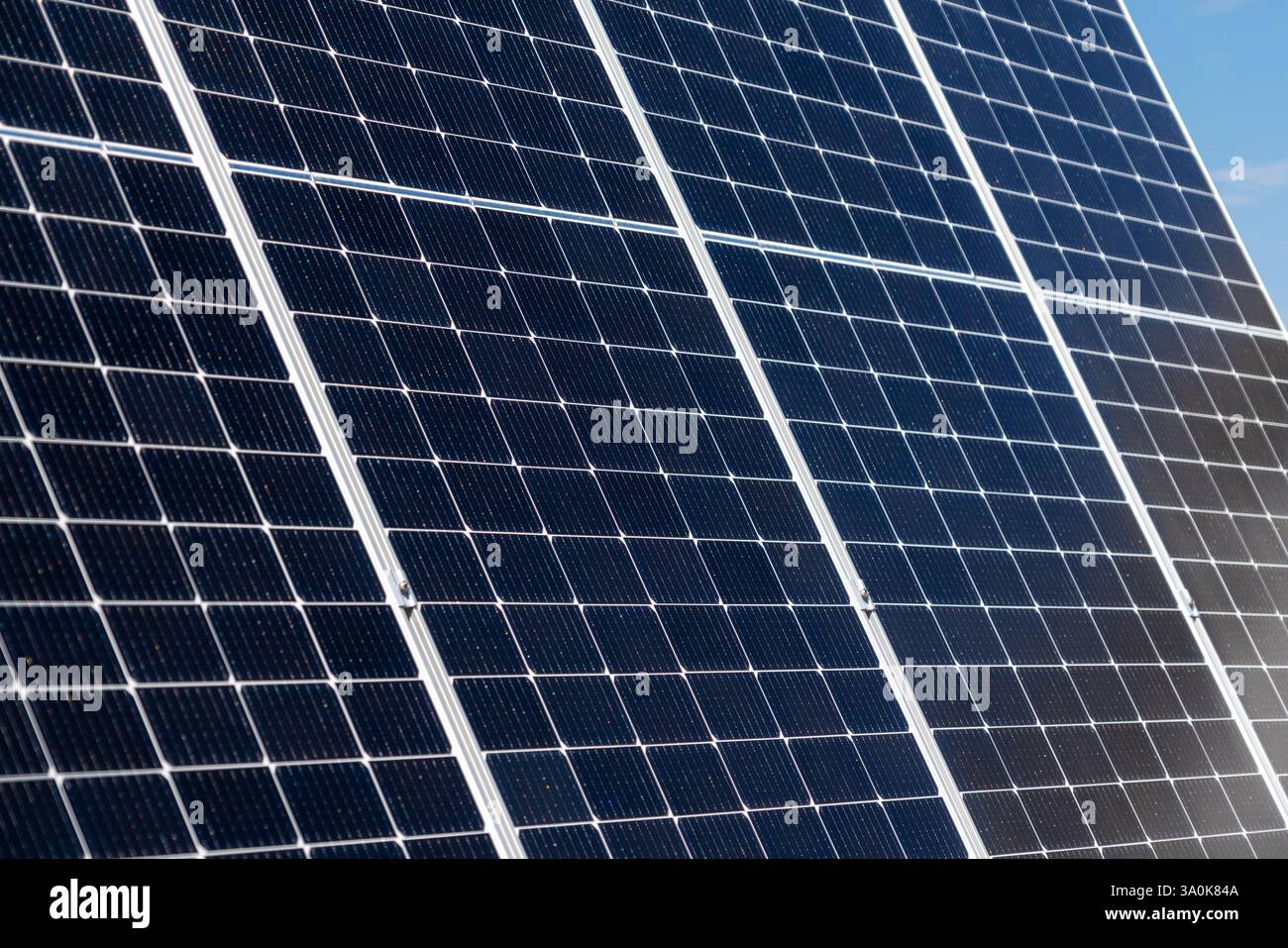 Diagonal view of bifacial solar panels at a solar energy station Stock ...